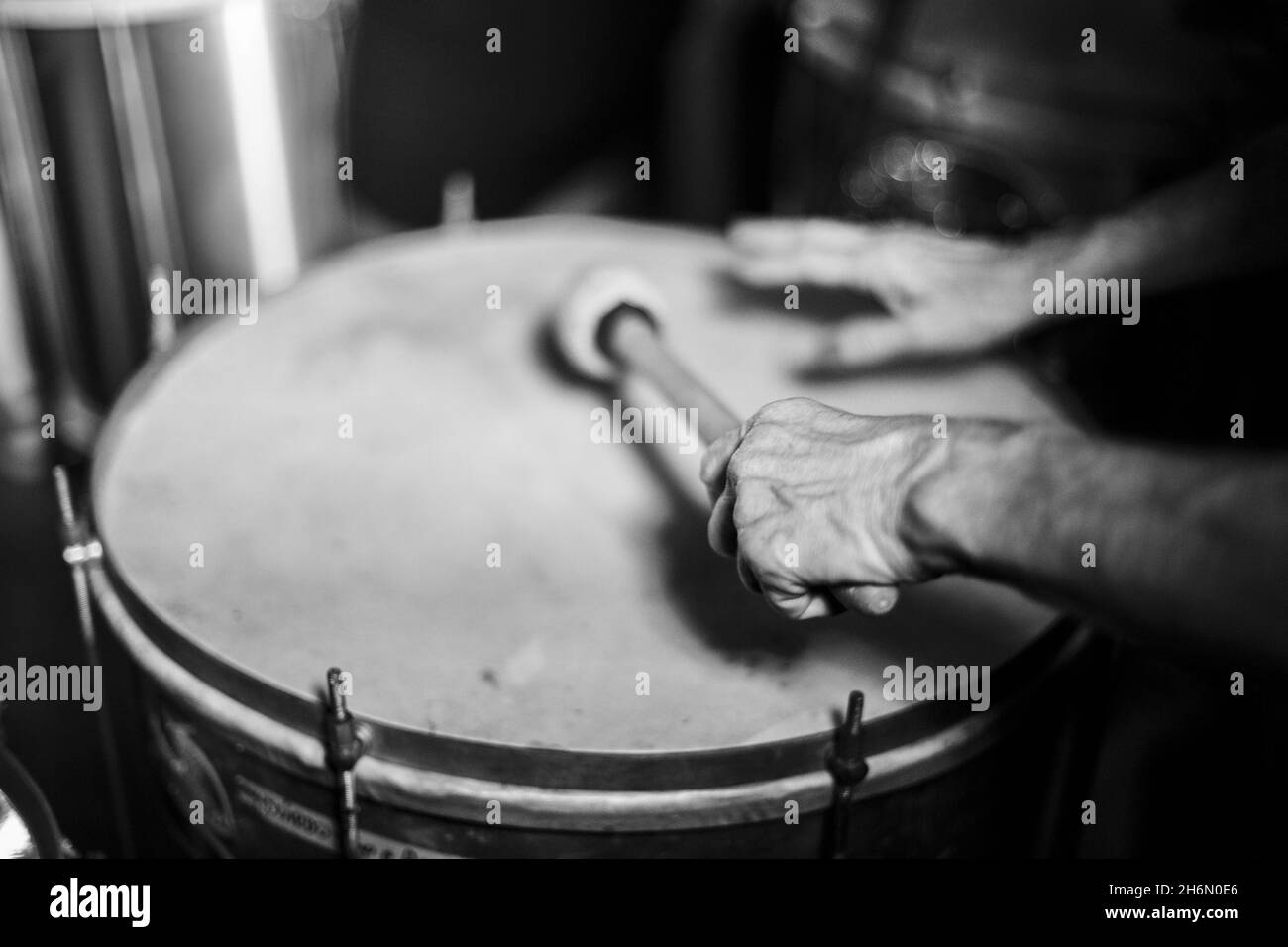 Closeup shot of a drum player hands in grayscale Stock Photo - Alamy