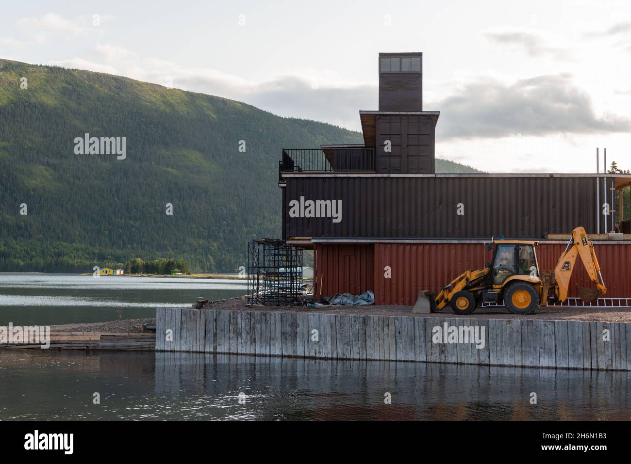 The exterior construction of a hotel uses shipping containers as ...