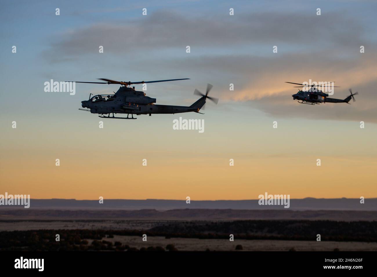 An AH-1Z Viper helicopter and an UH-1Y Venom helicopter assigned to ...