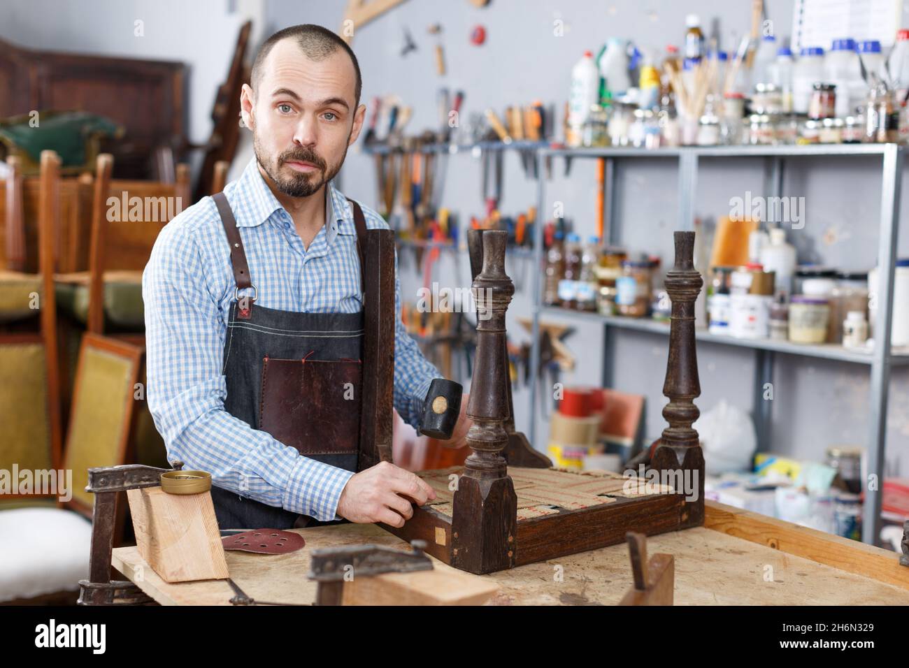 Craftsman using carpentry tools for restoration Stock Photo - Alamy