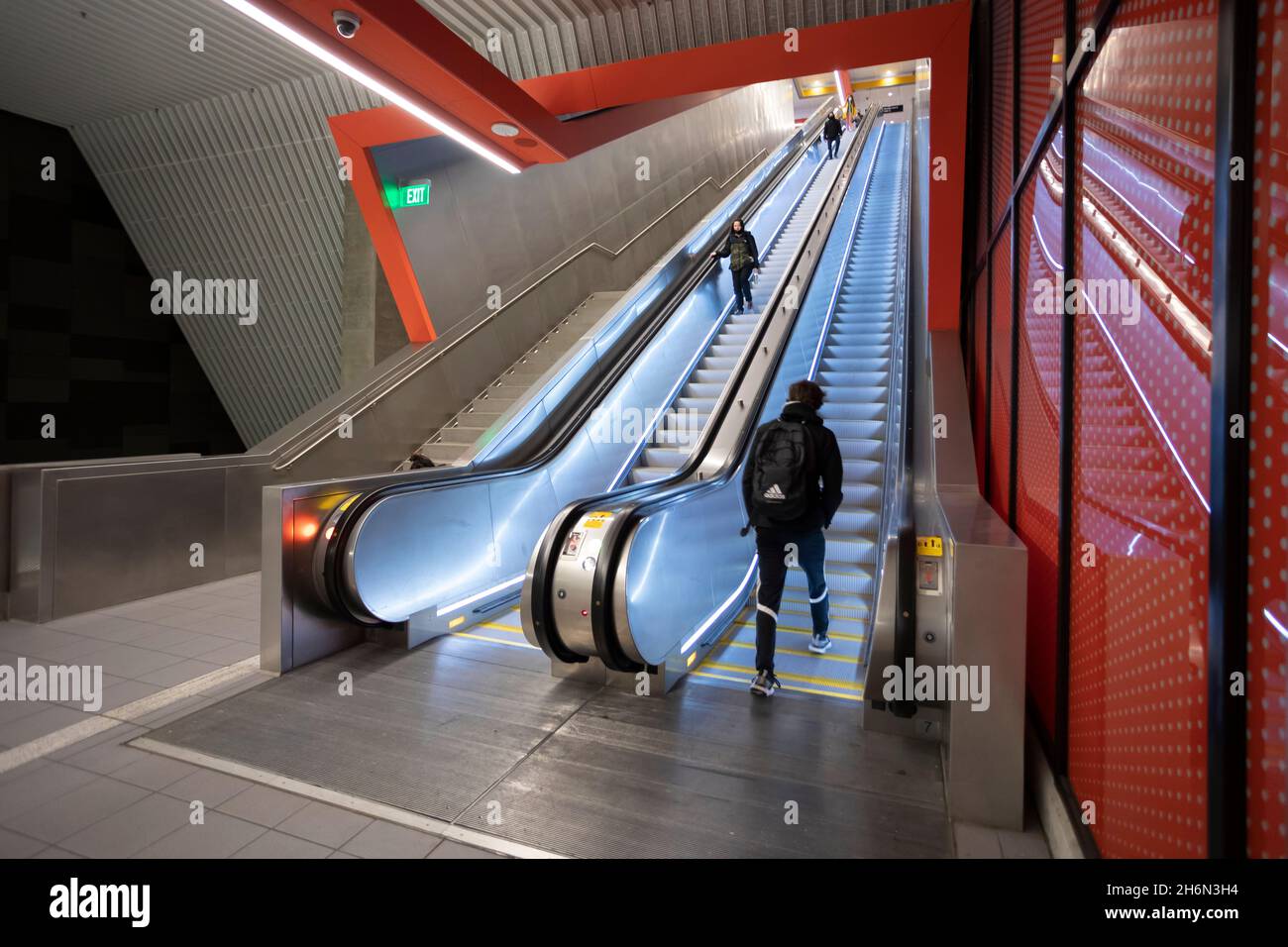 Passengers come and go at the new Link Light Rail U District Station in ...