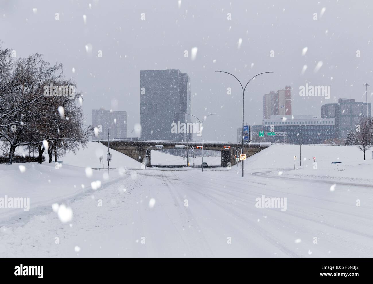 Snow falls on a road in Longueuil, Quebec, Canada Stock Photo - Alamy