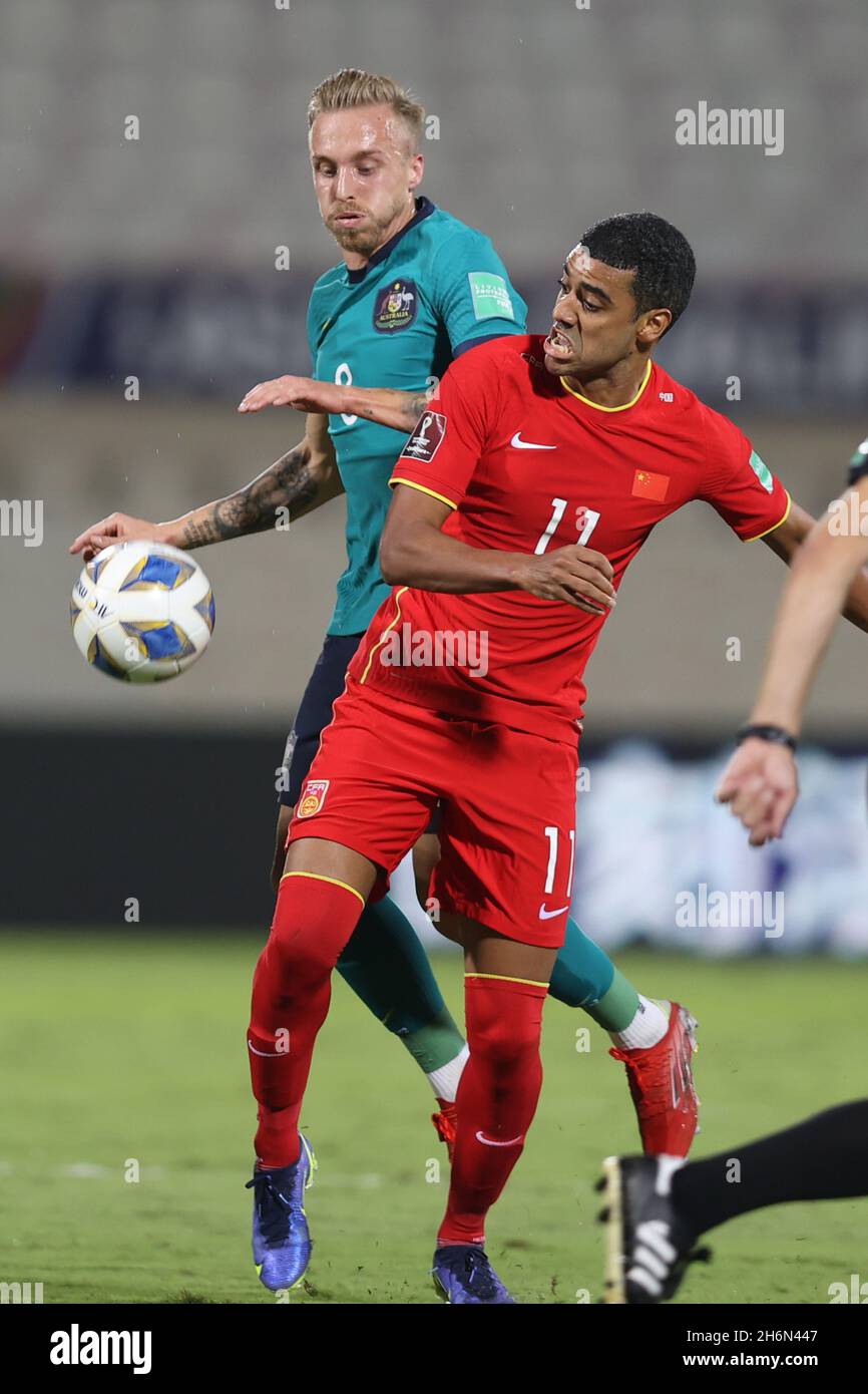 Sharjah. 17th Nov, 2021. A Lan (R) of China vies with James Jeggo of ...