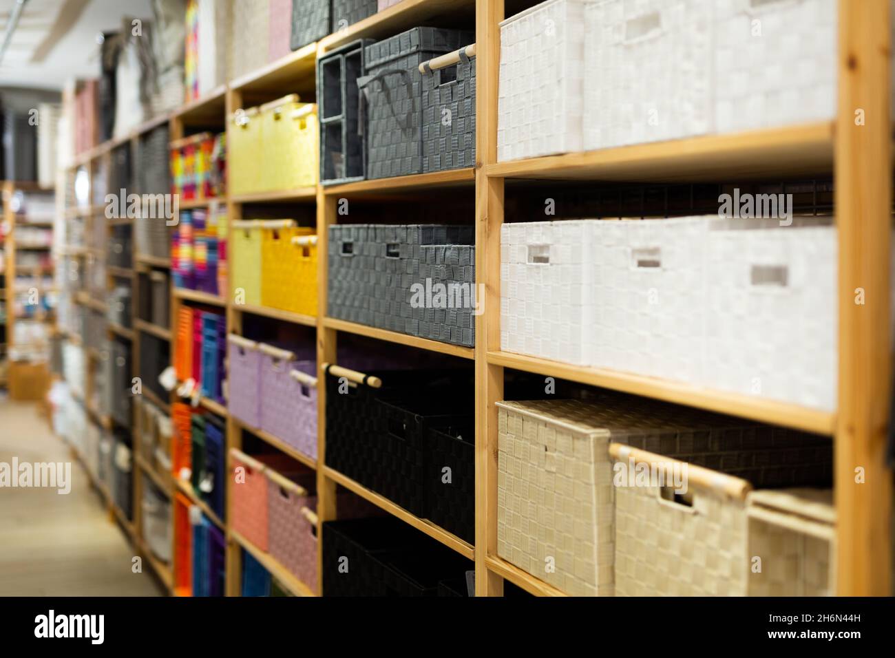 Decorative storage boxes on shelving in household goods store Stock ...