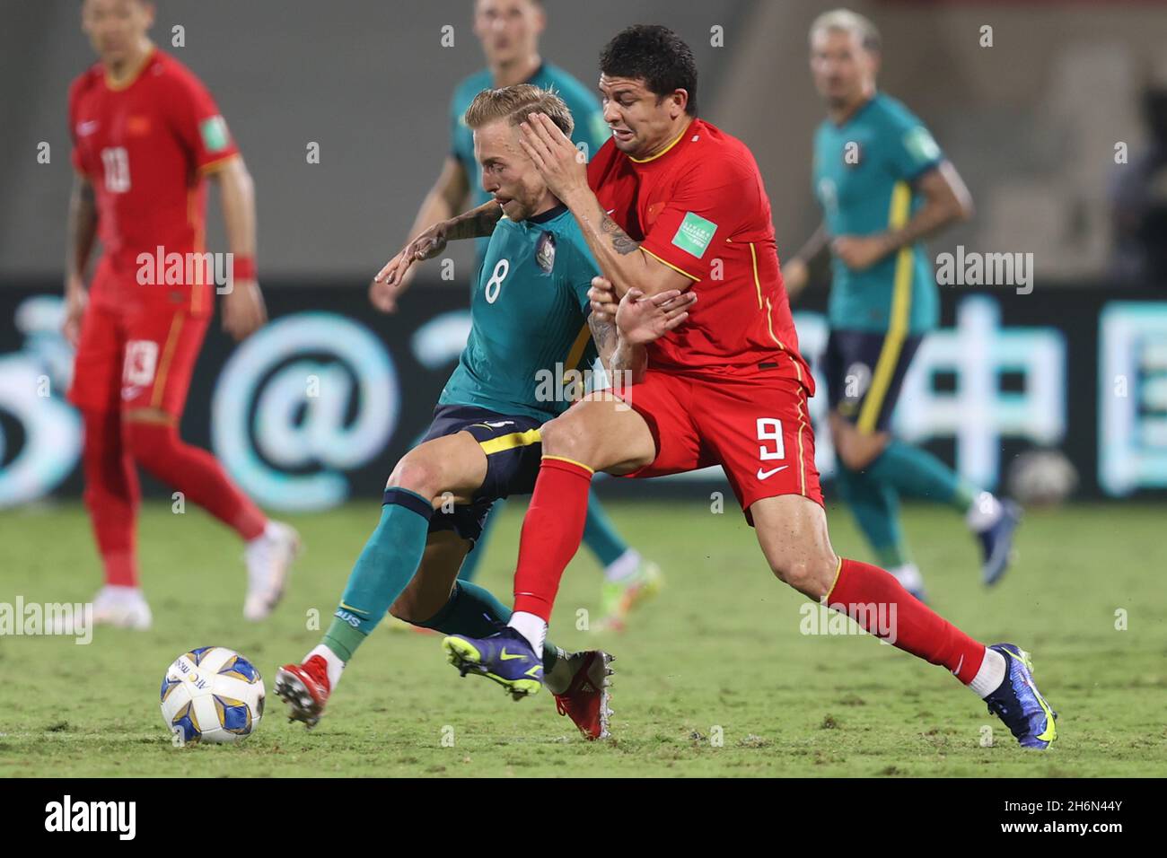 Sharjah. 17th Nov, 2021. Ai Kesen (R) of China vies with James Jeggo of ...
