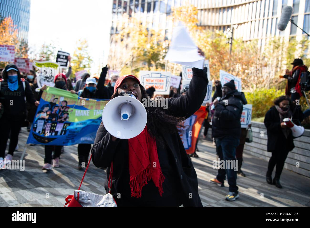 A protester chants slogans on a megaphone during the demonstration ...