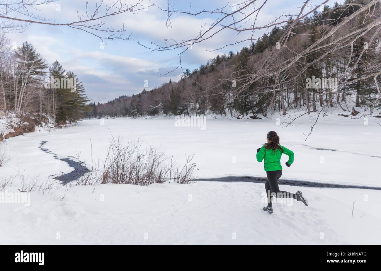Winter running in mountain forest nature river with snowing weather ...