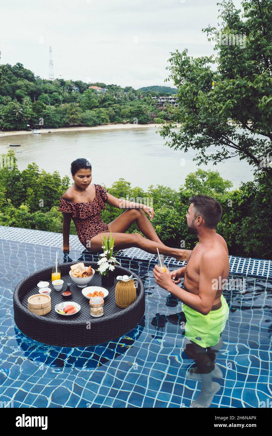 Dining with friends exotic hi-res stock photography and images - Alamy