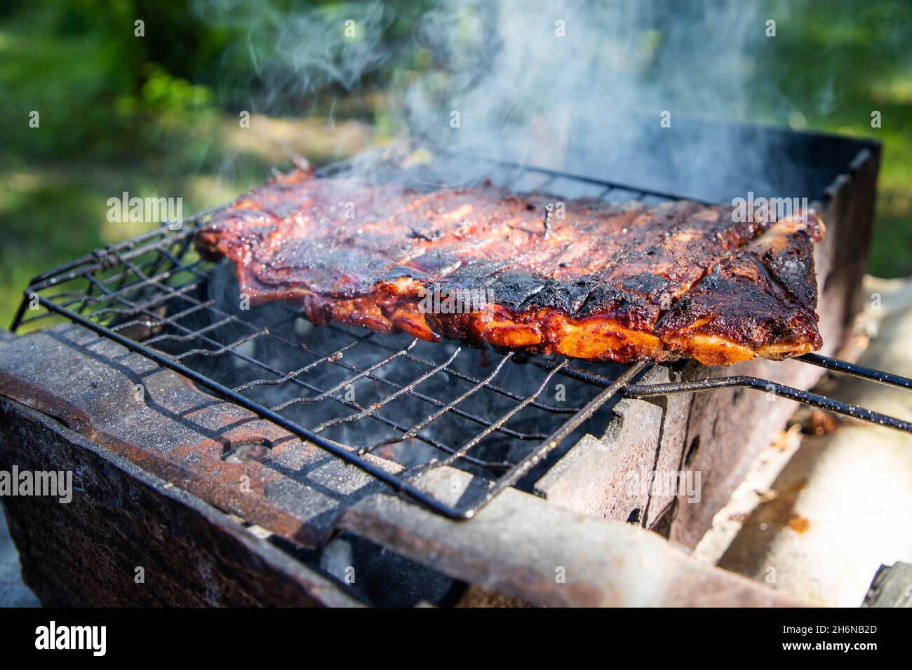 Hanging barbecue grill hi-res stock photography and images - Alamy