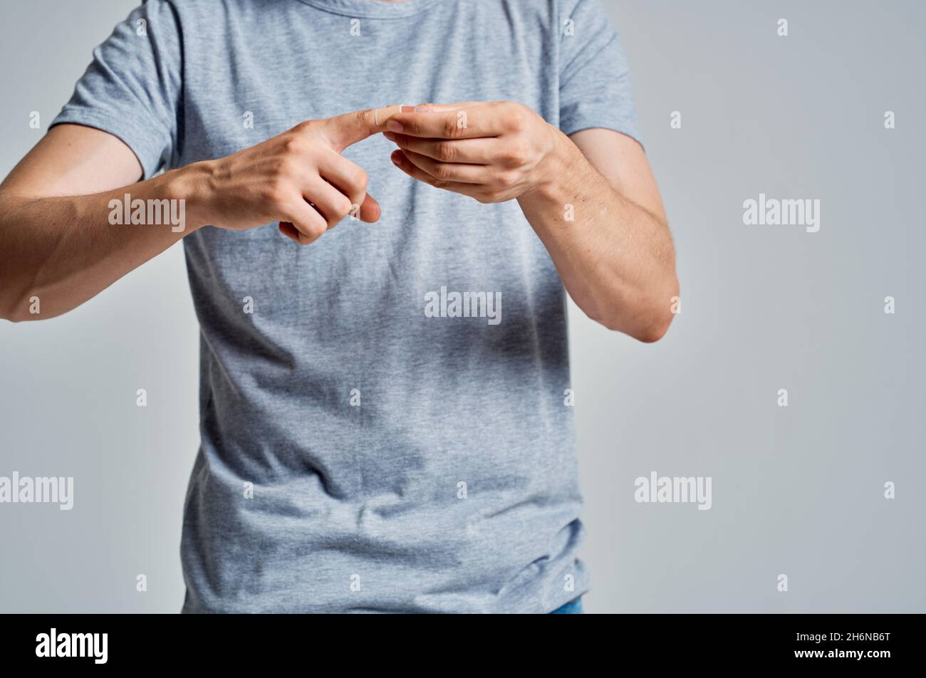 man with bandaged finger help treatment Stock Photo - Alamy