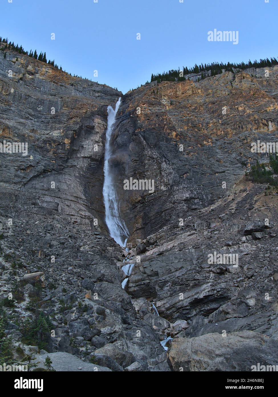 Low angle view of famous water fall Takakkaw Falls in Yoho National ...