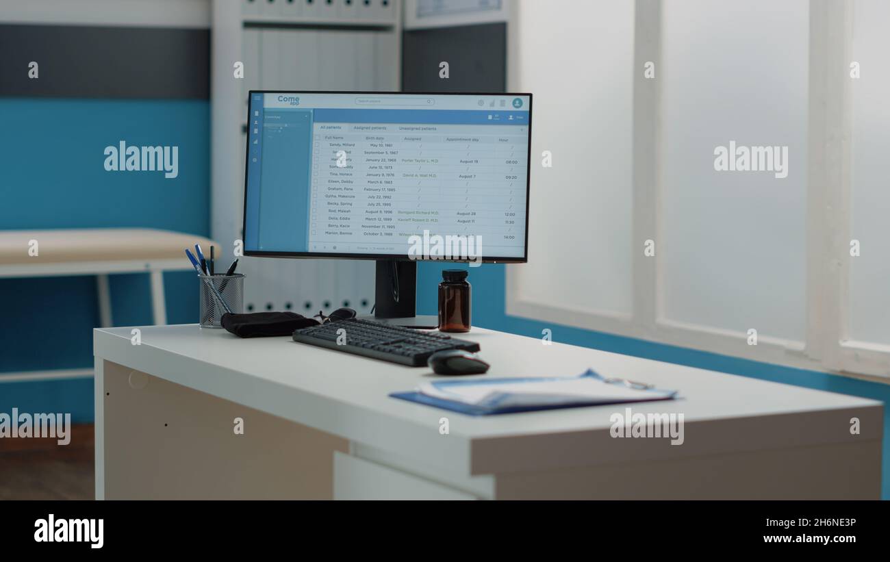 Close up of computer with medical files on monitor in cabinet. Nobody ...