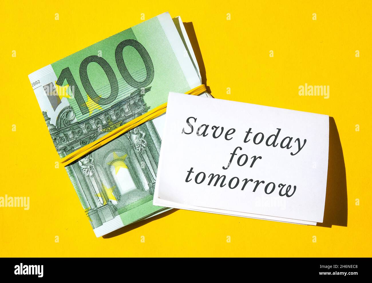 Paper note written text SAVINGS. Save money. Save today for tomorrow ...