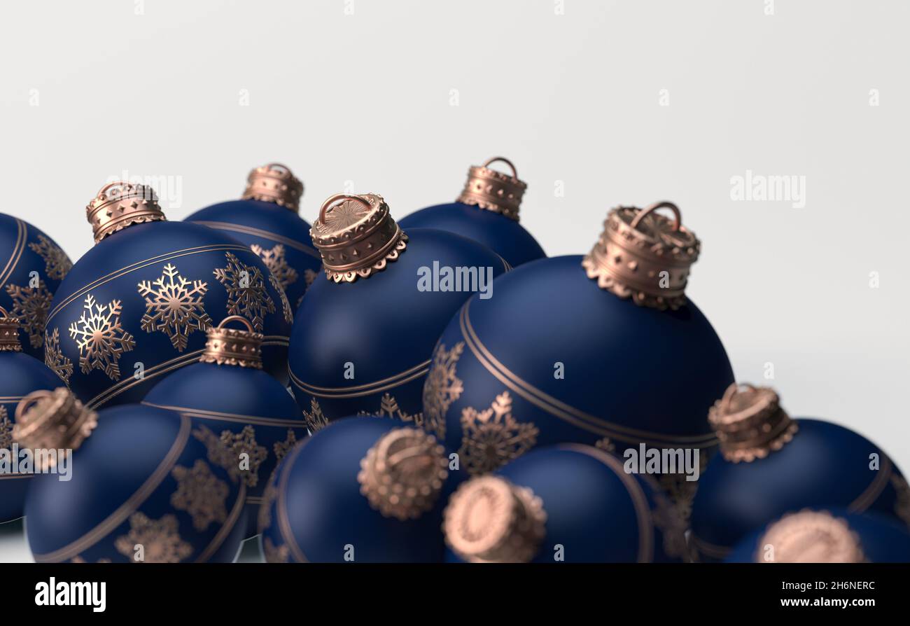 A collection of navy blue christmas baubles decorated with fine ornate ...