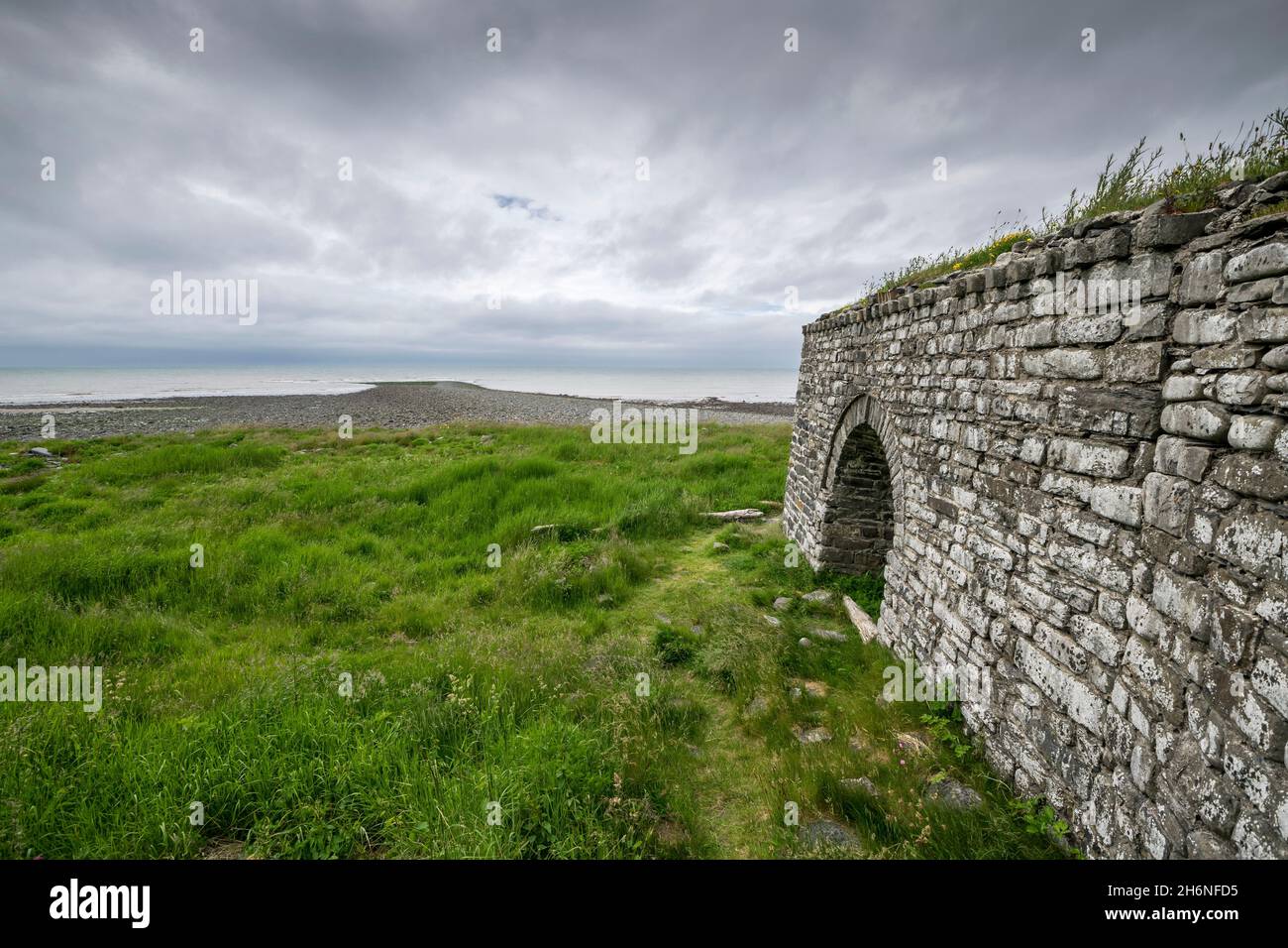 Sarn Gynfelyn shingle spit and Limestone Kiln at Wallog on the coast of ...