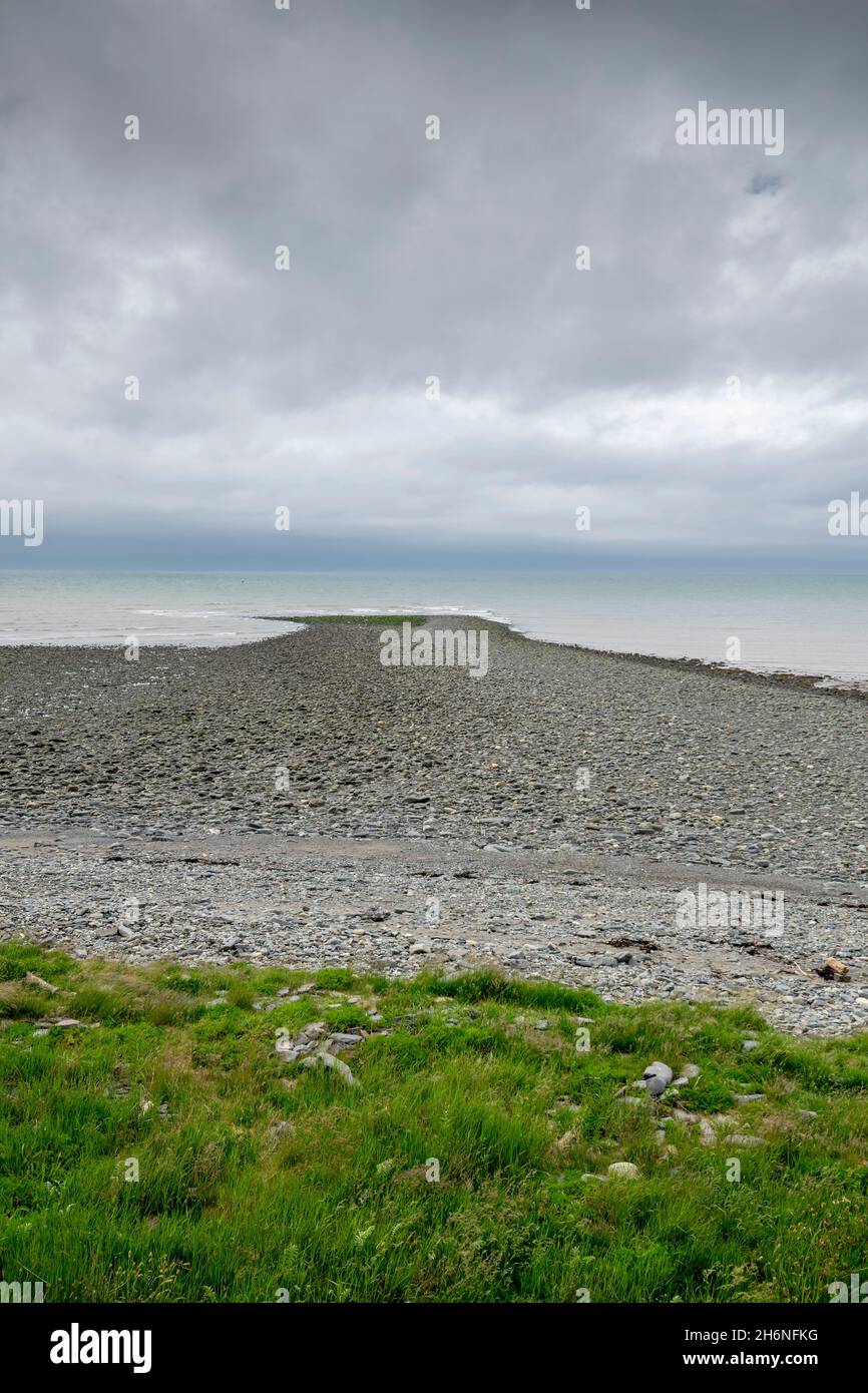 Sarn Gynfelyn shingle spit at Wallog on the coast of Cardigan bay near ...