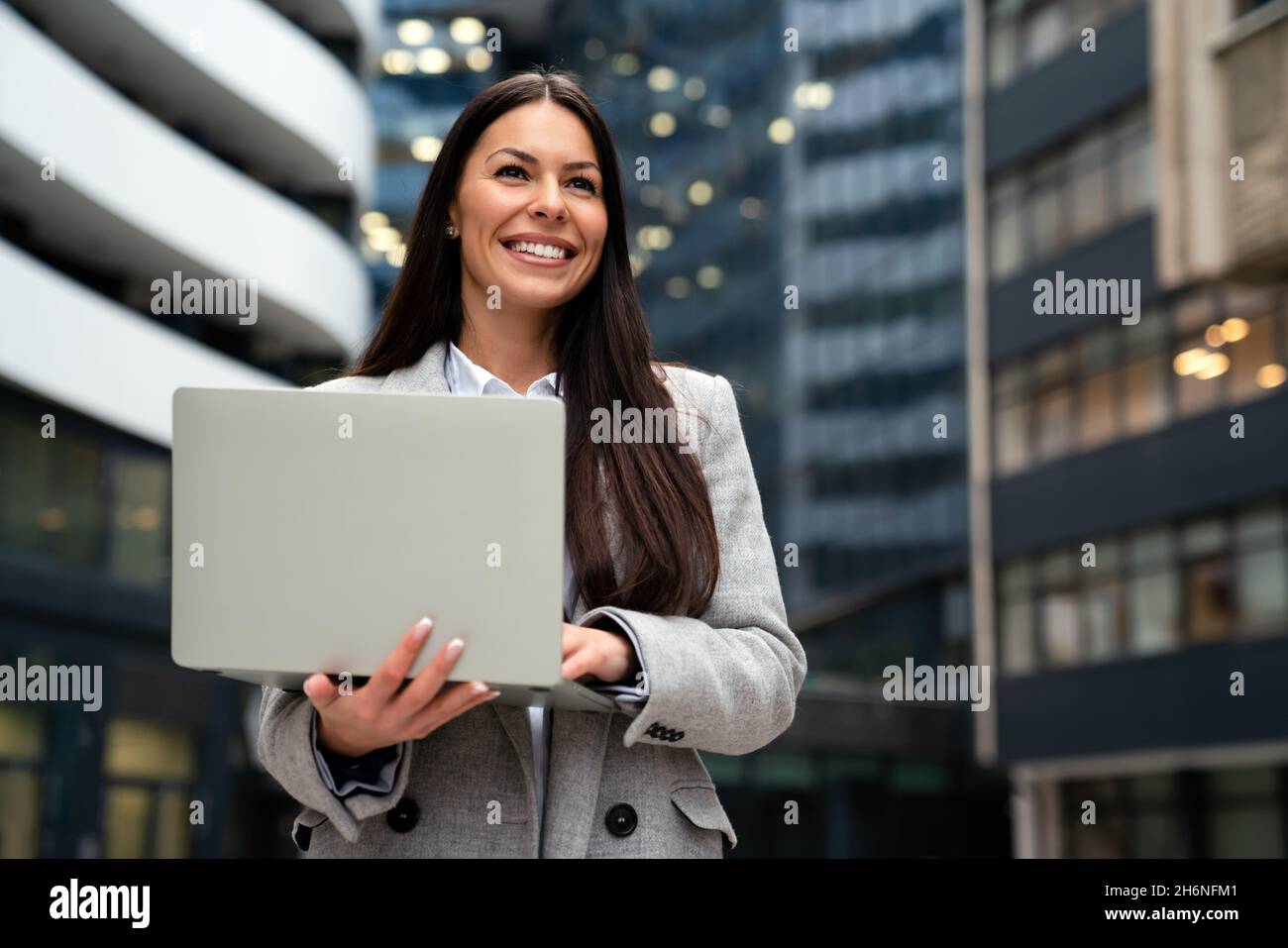 Beautiful business professional woman in the city outdoor. Business ...