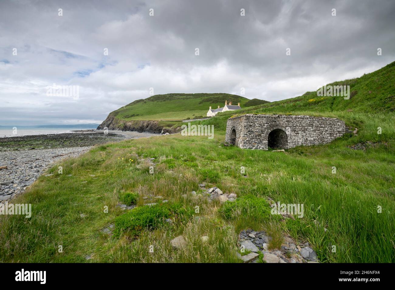 Sarn Gynfelyn shingle spit and Limestone Kiln at Wallog on the coast of ...
