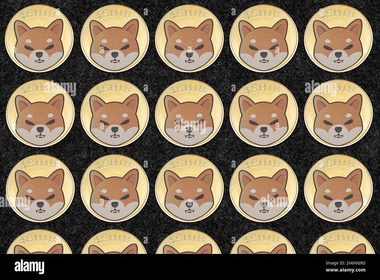 Shiba Inu cryptocurrency coins on a dark background Stock Photo - Alamy