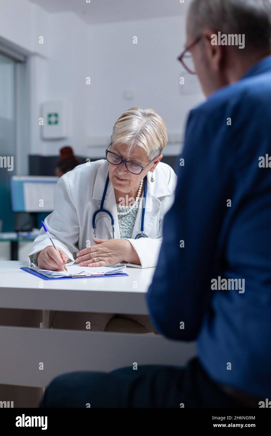 Close up woman signing checkup hi-res stock photography and images - Alamy