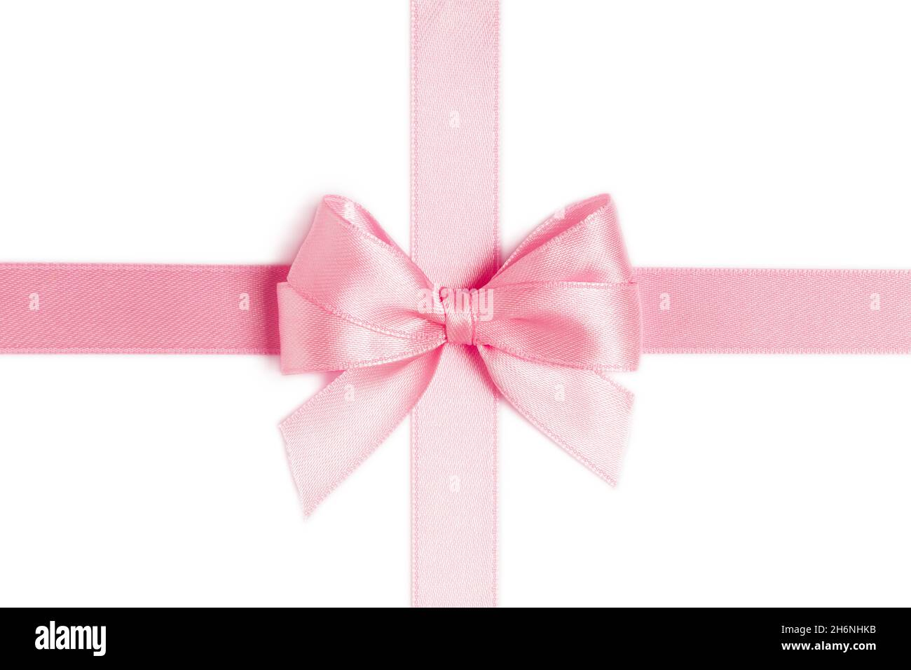 Beautiful pink satin ribbon with bow isolated on white Stock Photo - Alamy