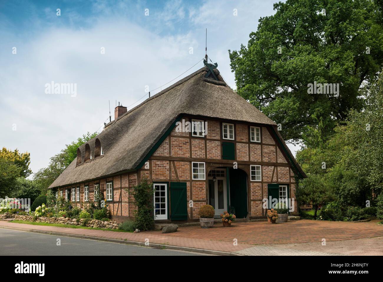 Thatched half-timbered house and summer garden, Egestorf, Lueneburg ...