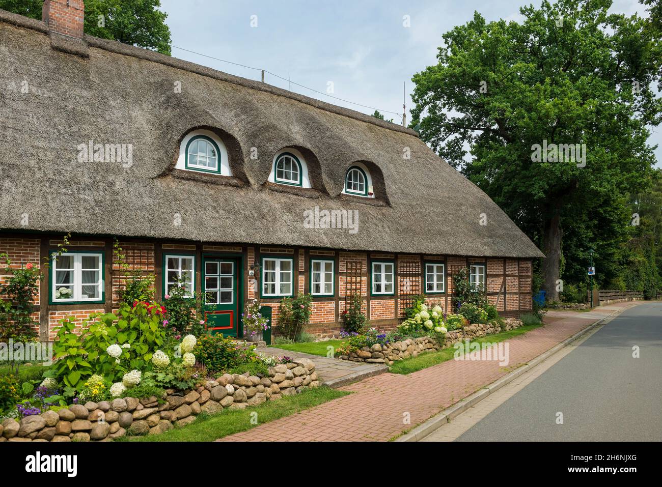 Thatched half-timbered house and summer garden, Egestorf, Lueneburg ...