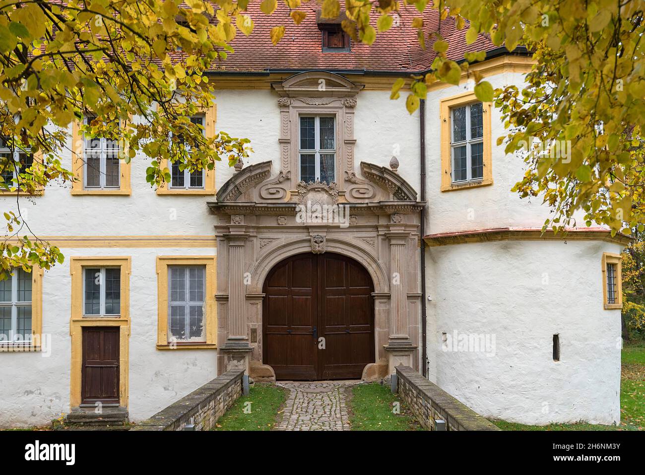 Entrance portal with coat of arms from the former moated castle, castle of Wonfurt, 16th century ...