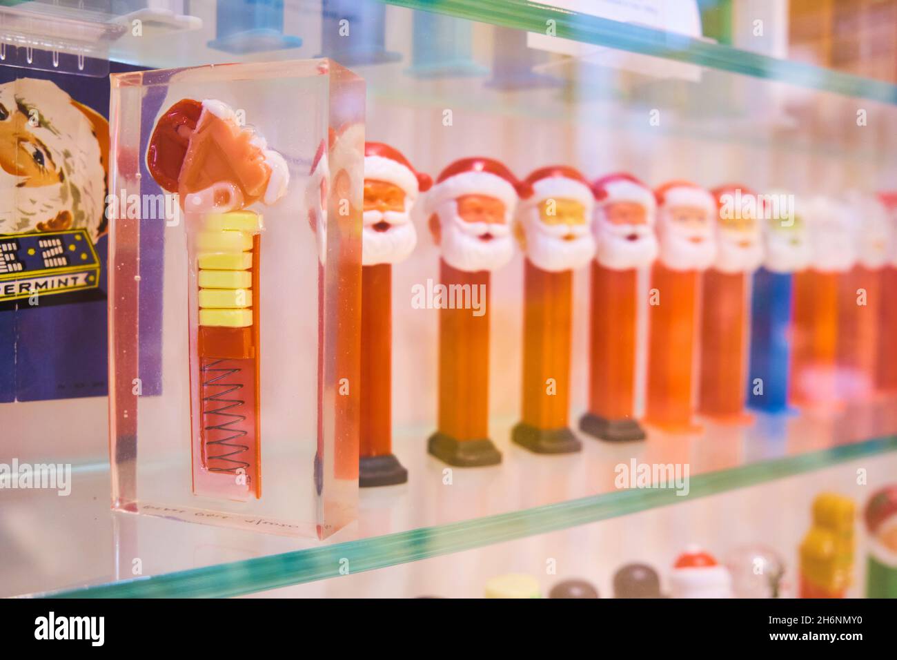 A cutaway look at a Santa Claus dispenser. At the Pez factory, museum ...