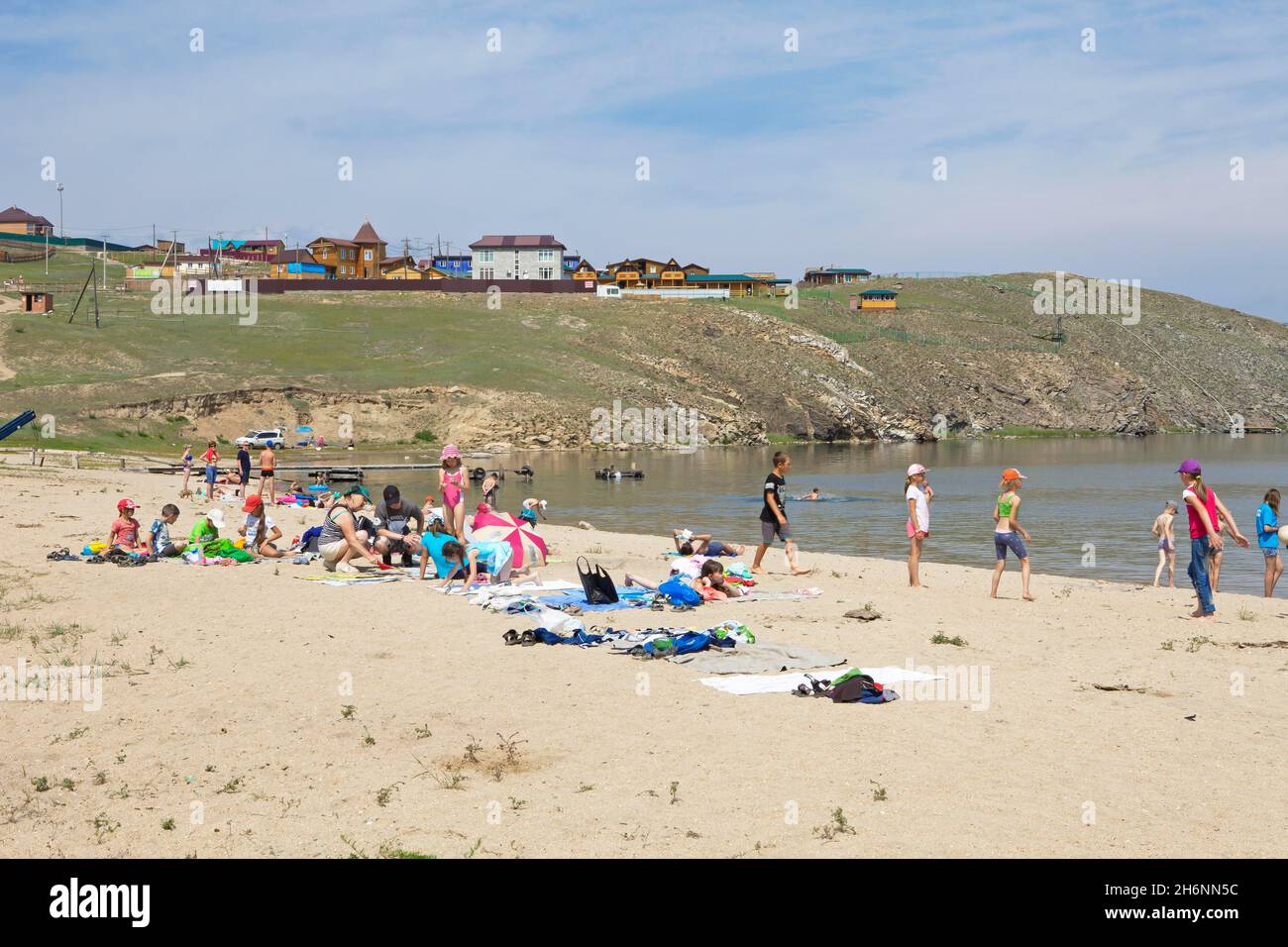 People on the beach of Bazarnaya Bay, Sahjurta, Pribaikalsky National ...