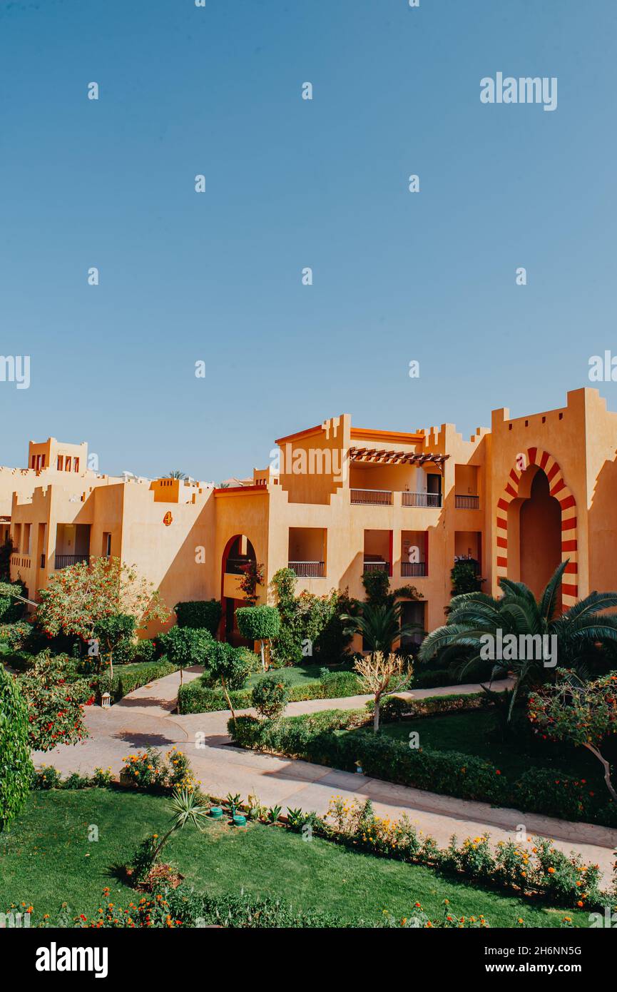 Luxury holiday villa with palm tree Stock Photo - Alamy