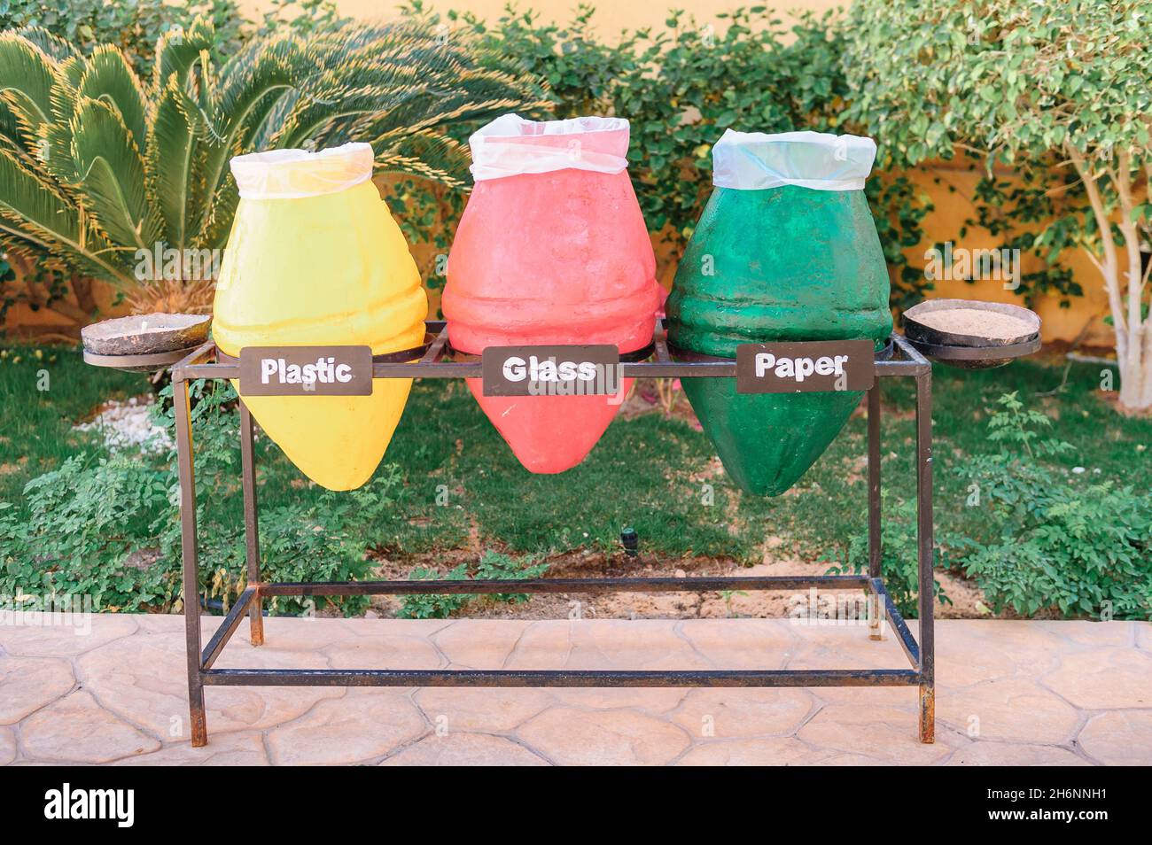 three bins for recycling. sorting debris - plastic, glass and paper ...