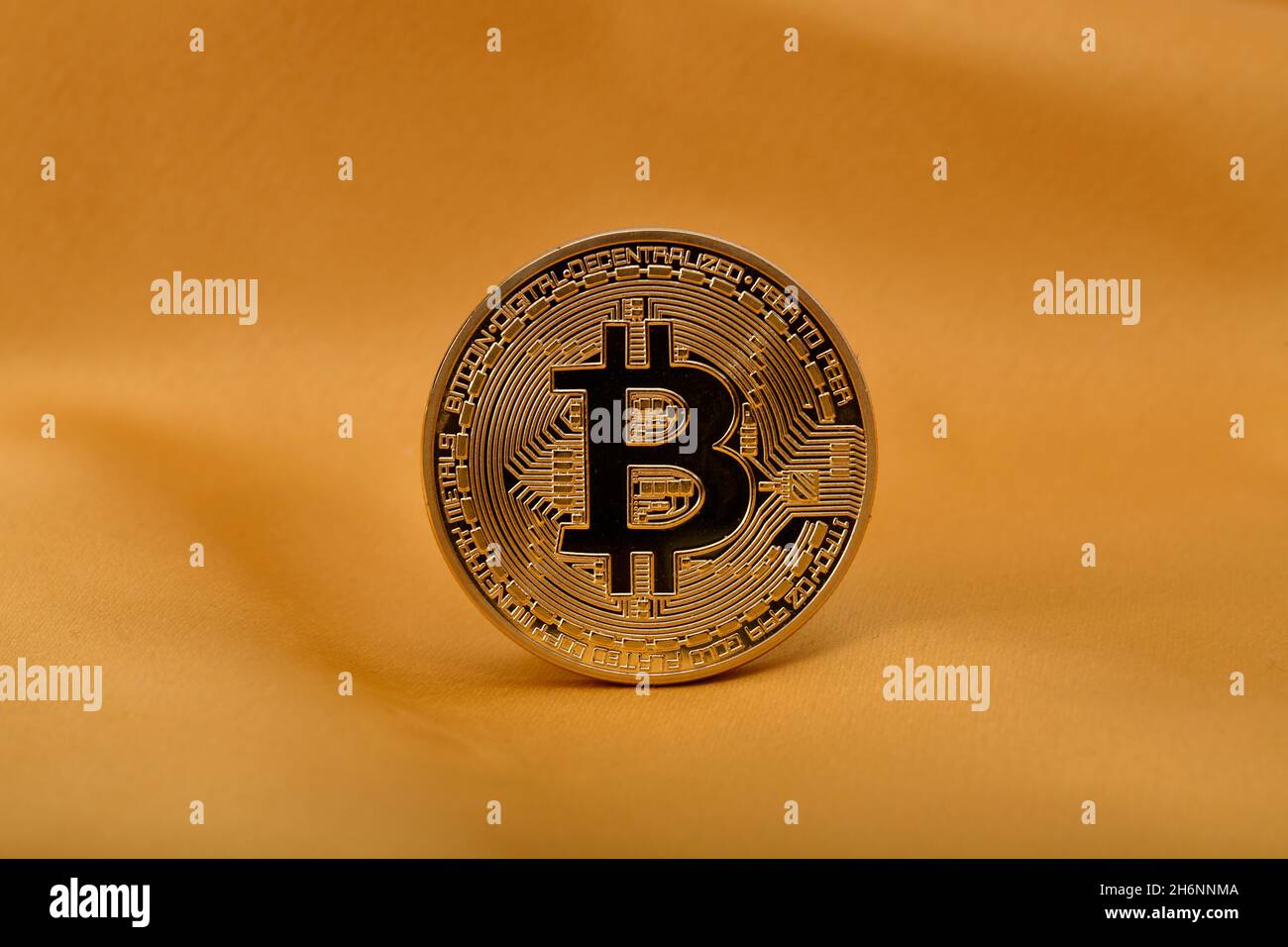 Symbol image digital currency, gold physical coin Bitcoin Stock Photo - Alamy