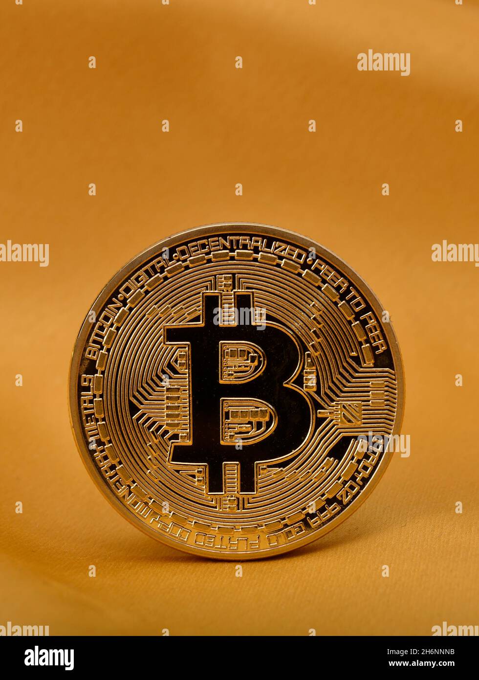 Symbol image digital currency, gold physical coin Bitcoin Stock Photo - Alamy