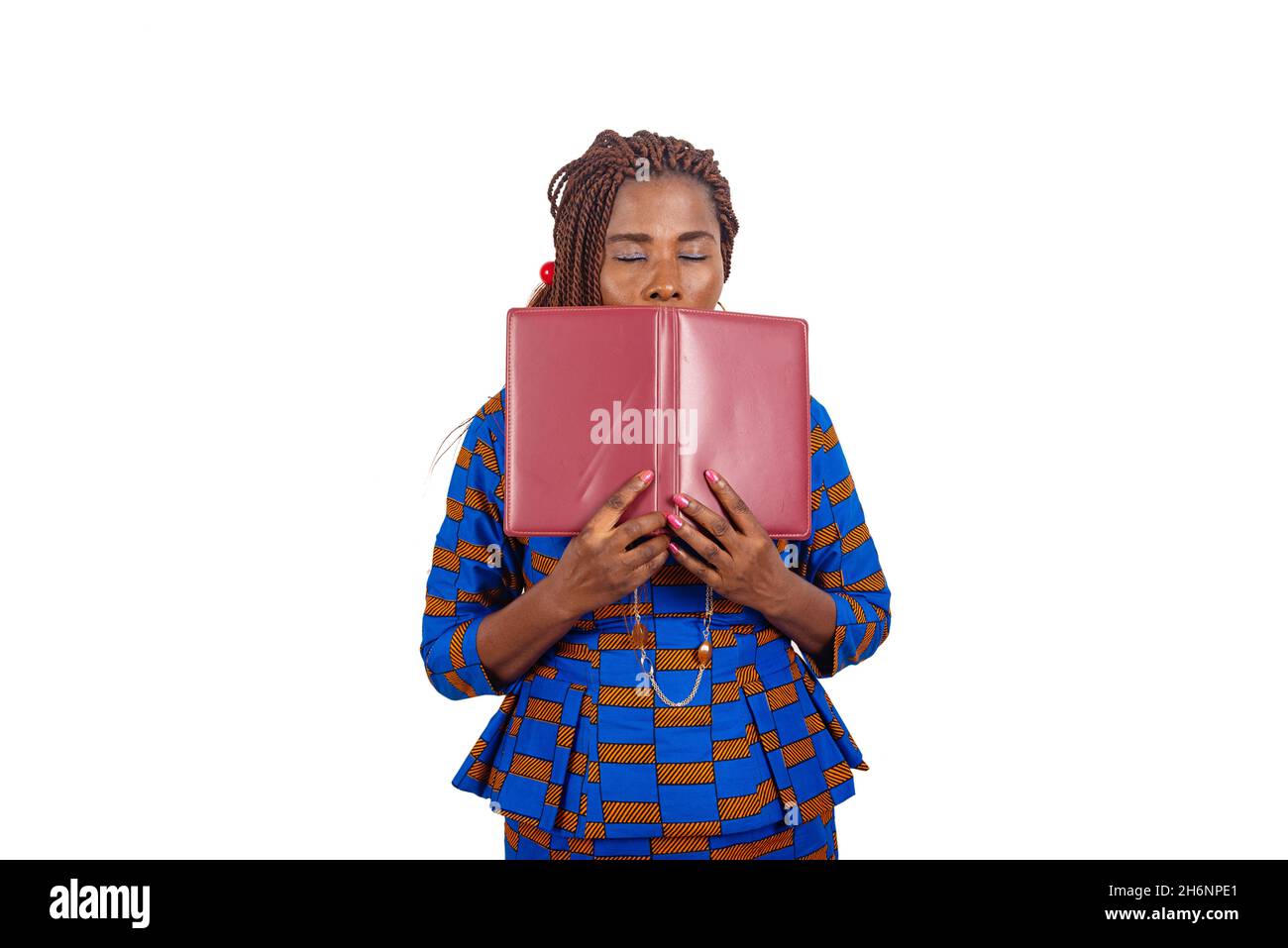 beautiful businesswoman in traditional dress standing sticking her ...