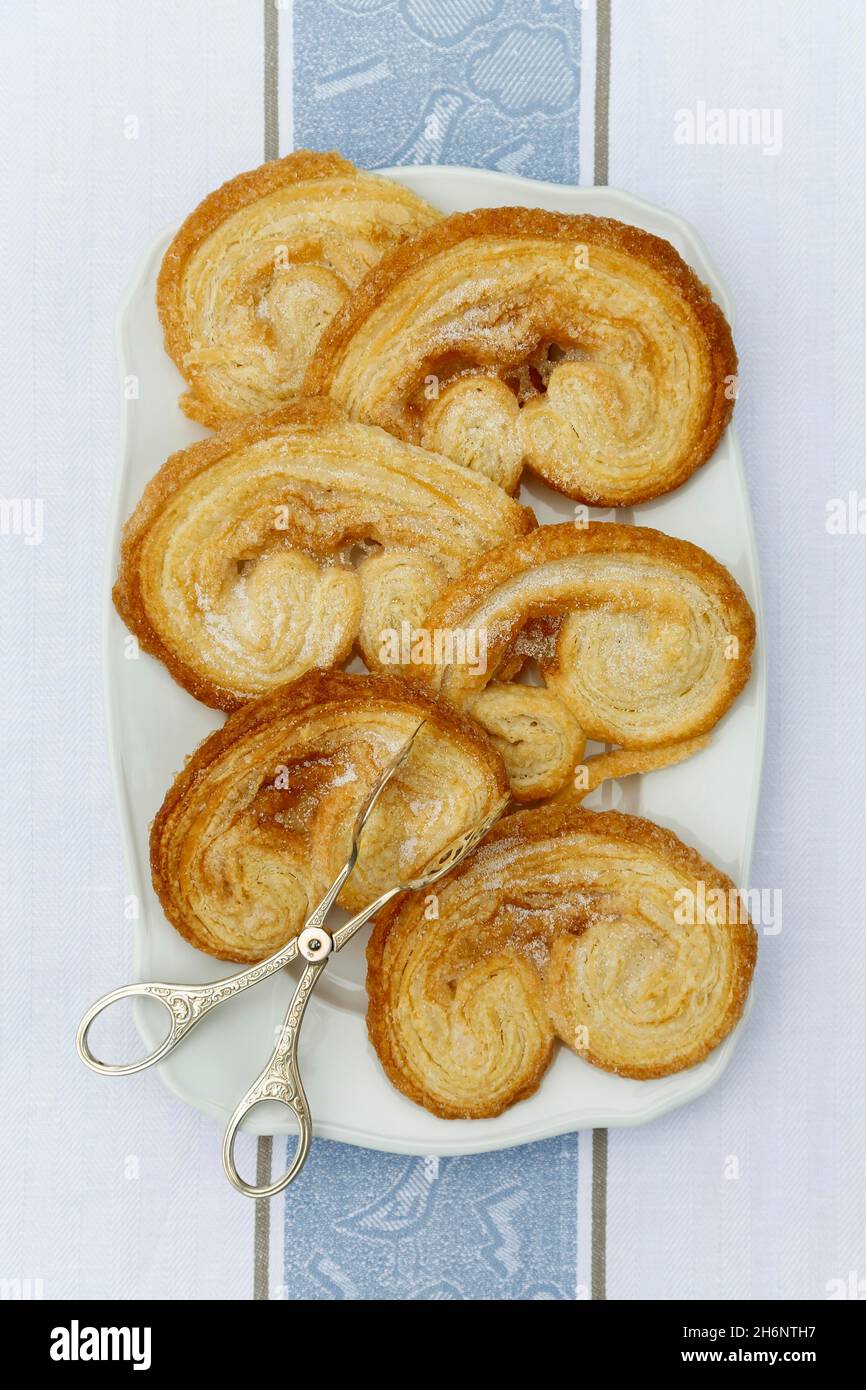 Swabian baking, sweet pig ears, sweet puff pastry, pastry tongs ...