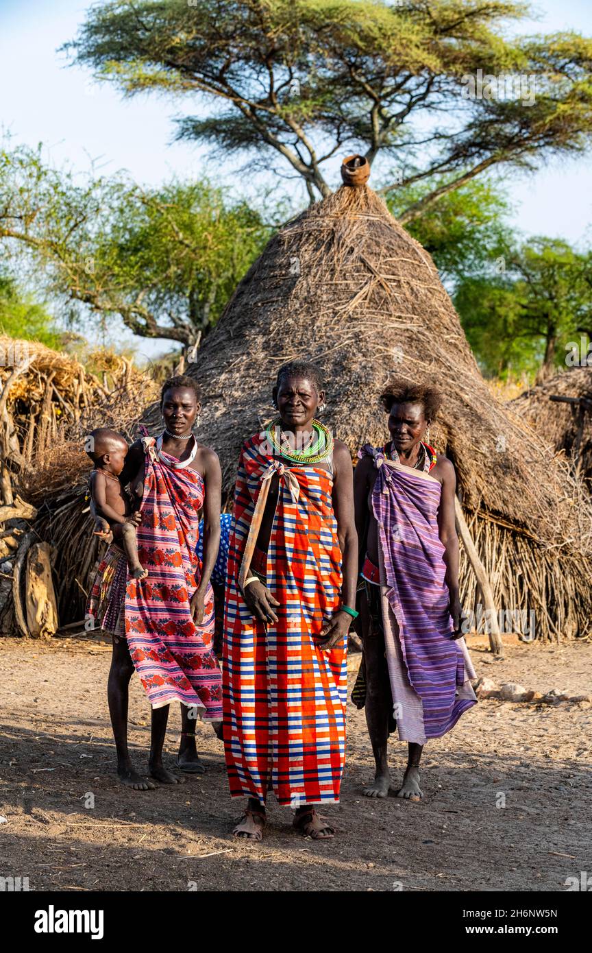 Older women from the Toposa tribe before their traditional hut, Eastern ...
