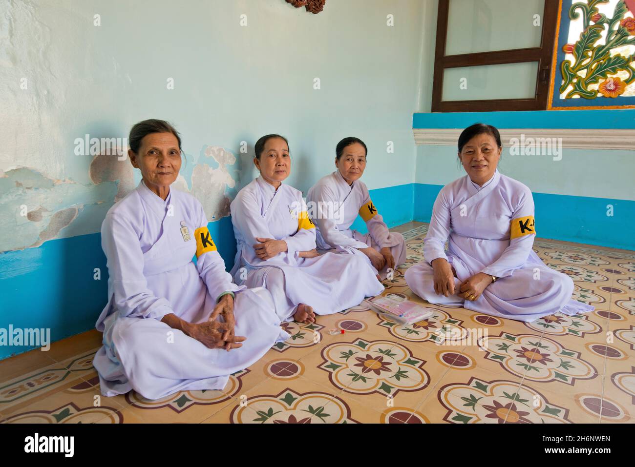 Caodaism religious group, guards at the Ceremonial Midday Prayer, Mass ...