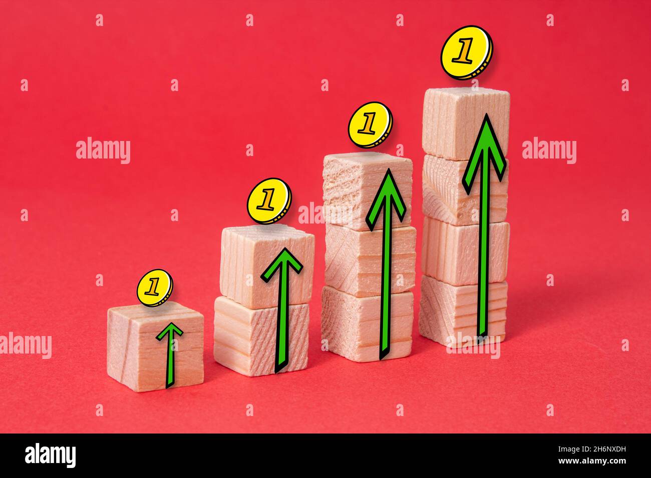 Closeup of the wooden blocks with green arrows Stock Photo - Alamy