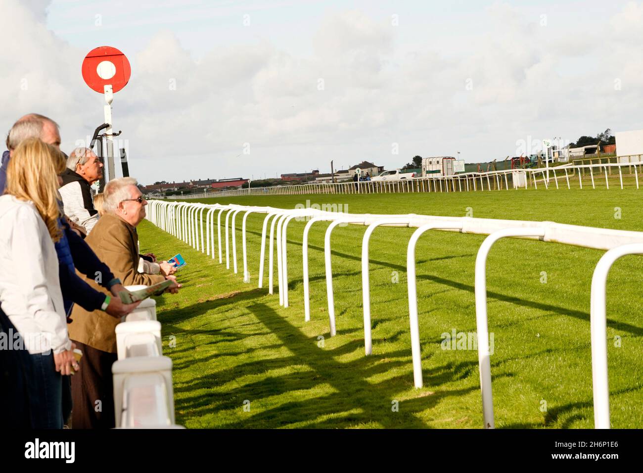 atmosphere and thrill of a day at the races with the crowd and the ...
