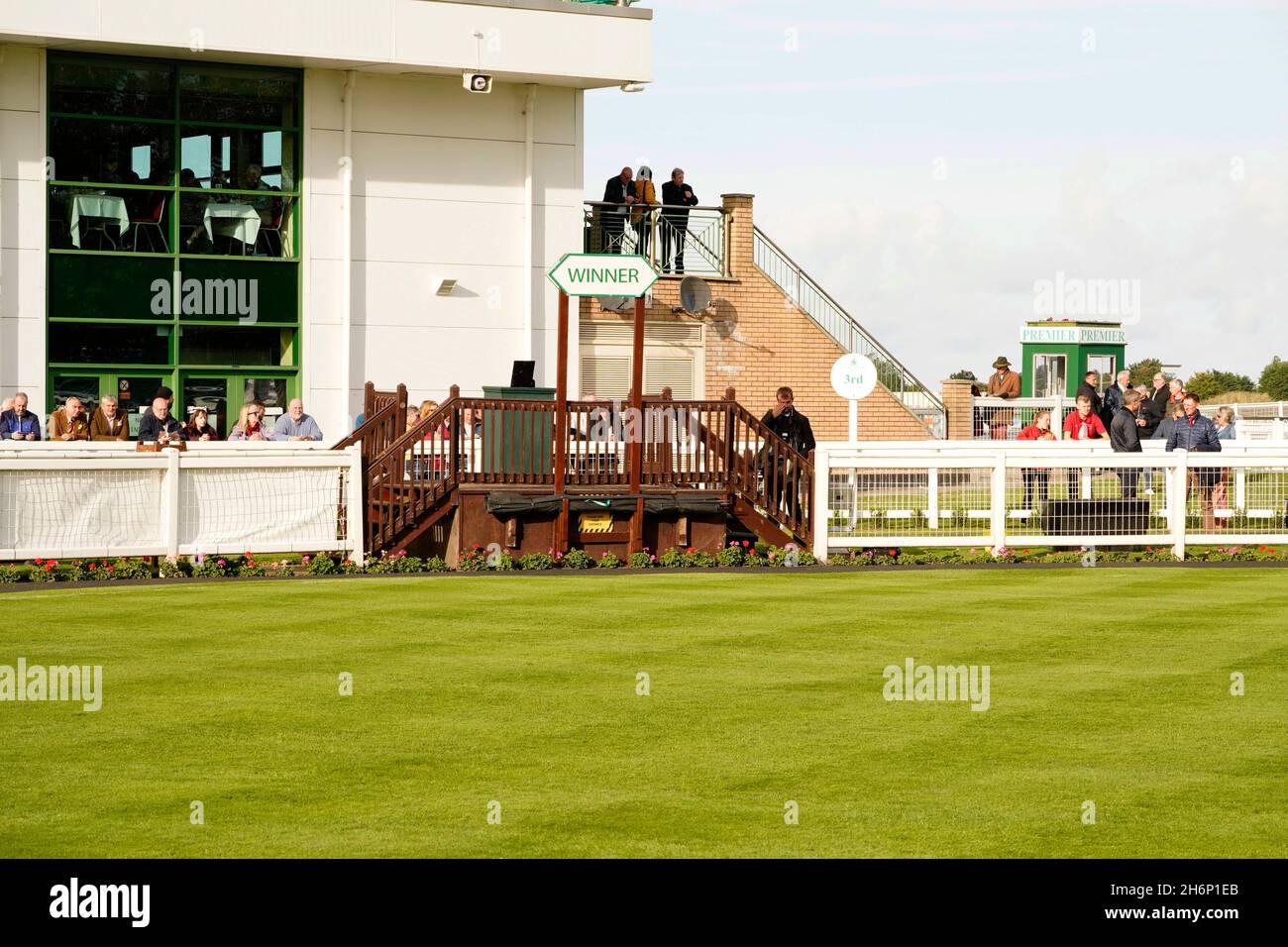 atmosphere and thrill of a day at the races with the crowd and the ...