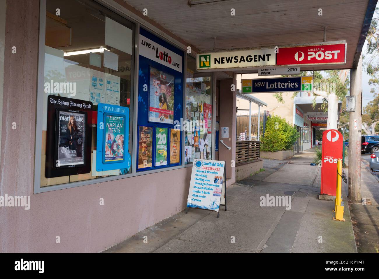 Magazine posters in the window of the combined Newsagent and Post ...