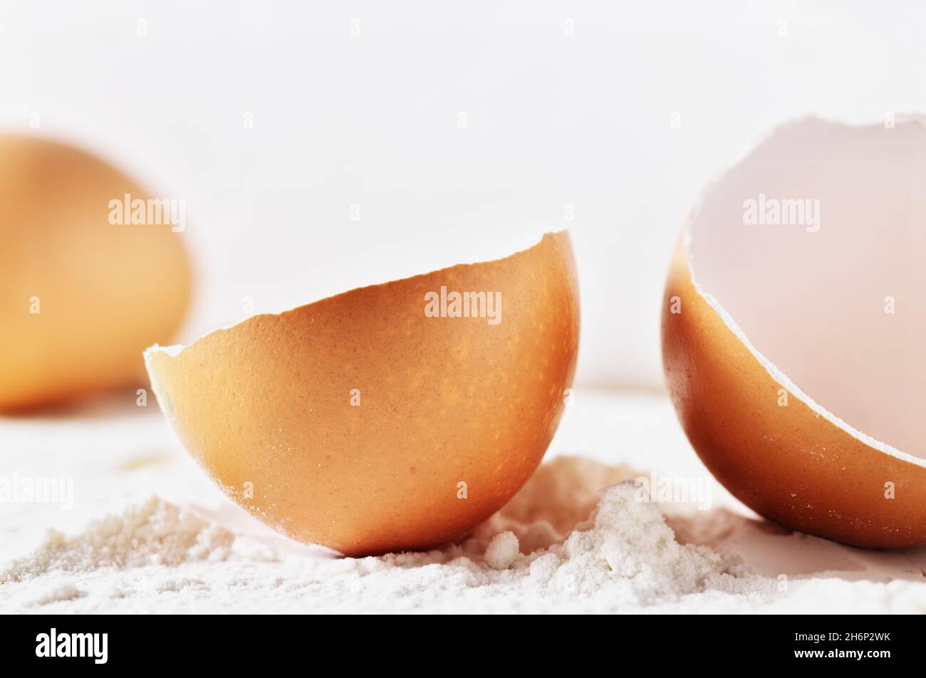 Eggshell and flour studio shot Stock Photo - Alamy