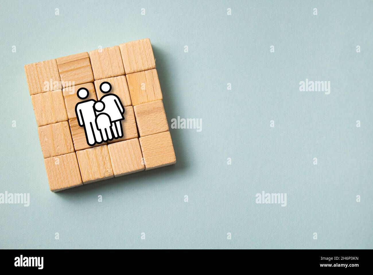 Closeup of the wooden blocks with the family icon Stock Photo - Alamy