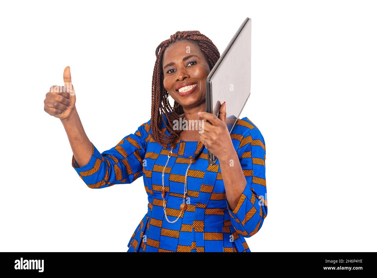beautiful adult woman carrying a computer on her shoulder and raising ...