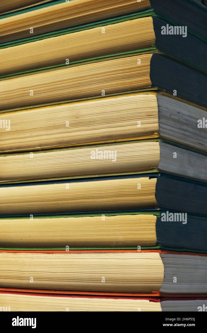 Stack of battered old books.Retro library and books Stock Photo - Alamy