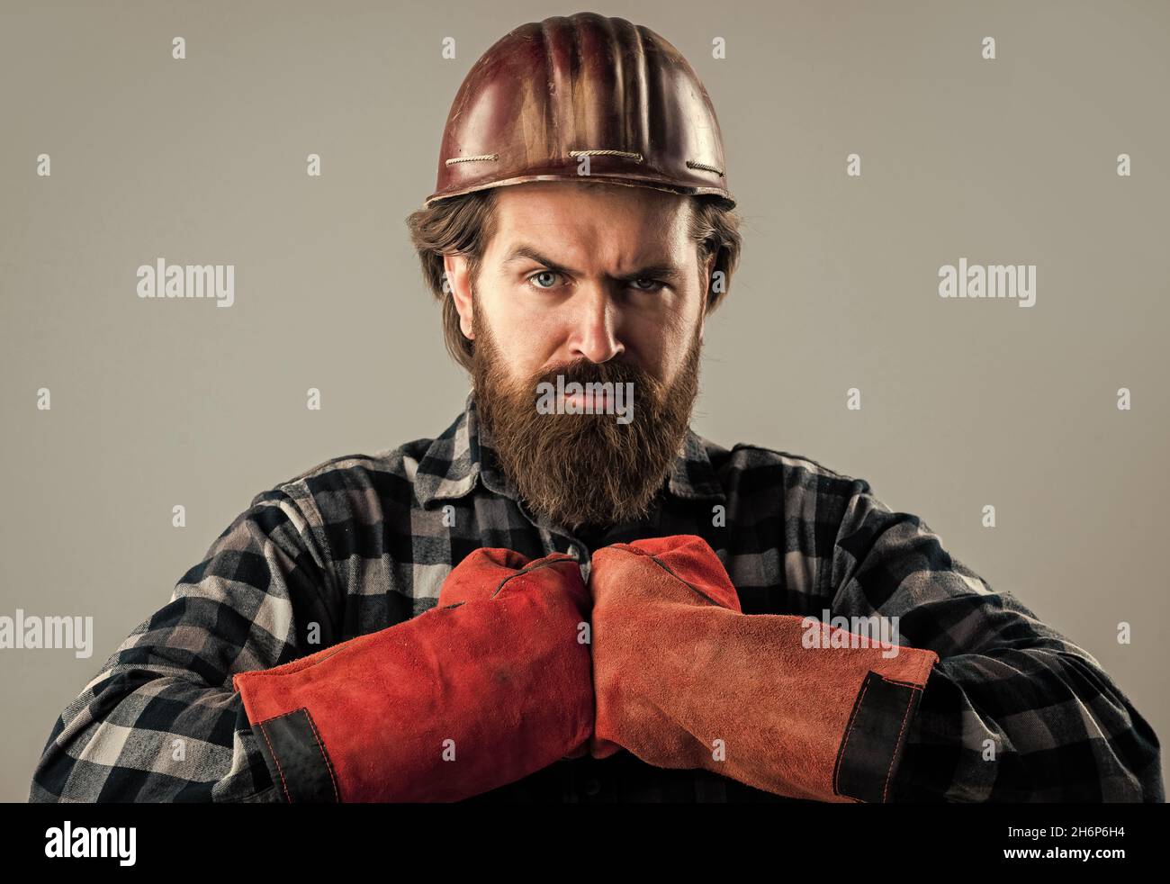 Repairman in uniform. guy builder with beard and moustache. male ...