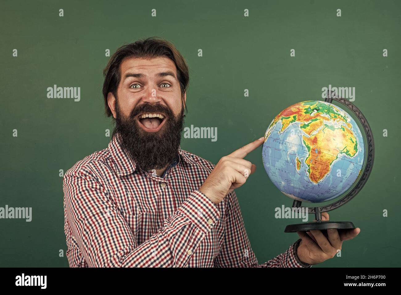 Geographer looking at map hi-res stock photography and images - Alamy