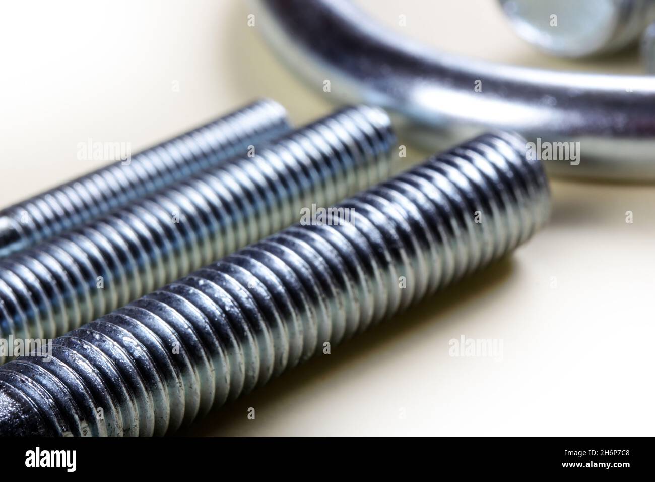 big metal screw on a white background Stock Photo - Alamy