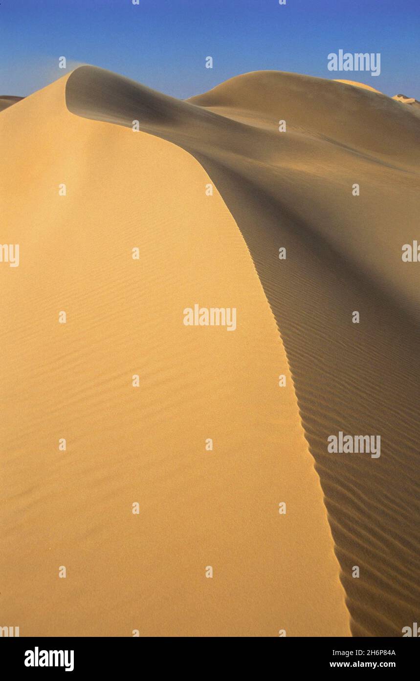 EGYPT. LIBYAN SAHARA, THE WHITE DESERT. SUNSET OVER THE GREAT SAND SEA ...